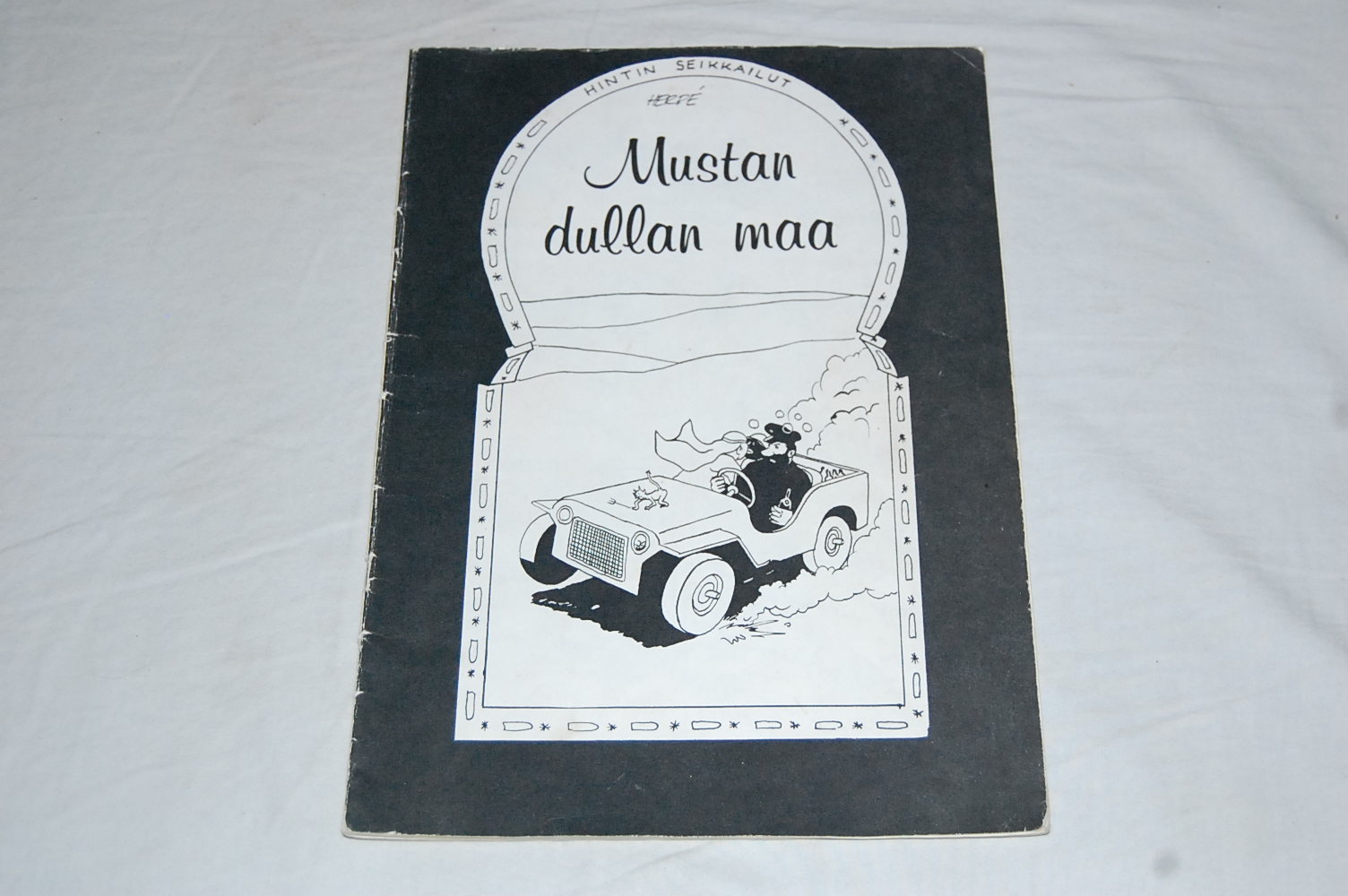 Herpé Mustan dullan maa